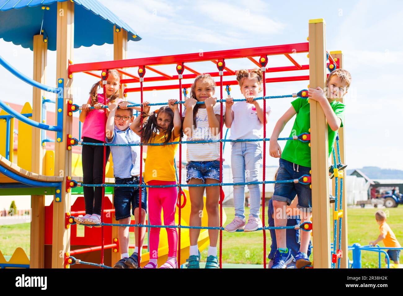 Group of children on playground Stock Photo - Alamy