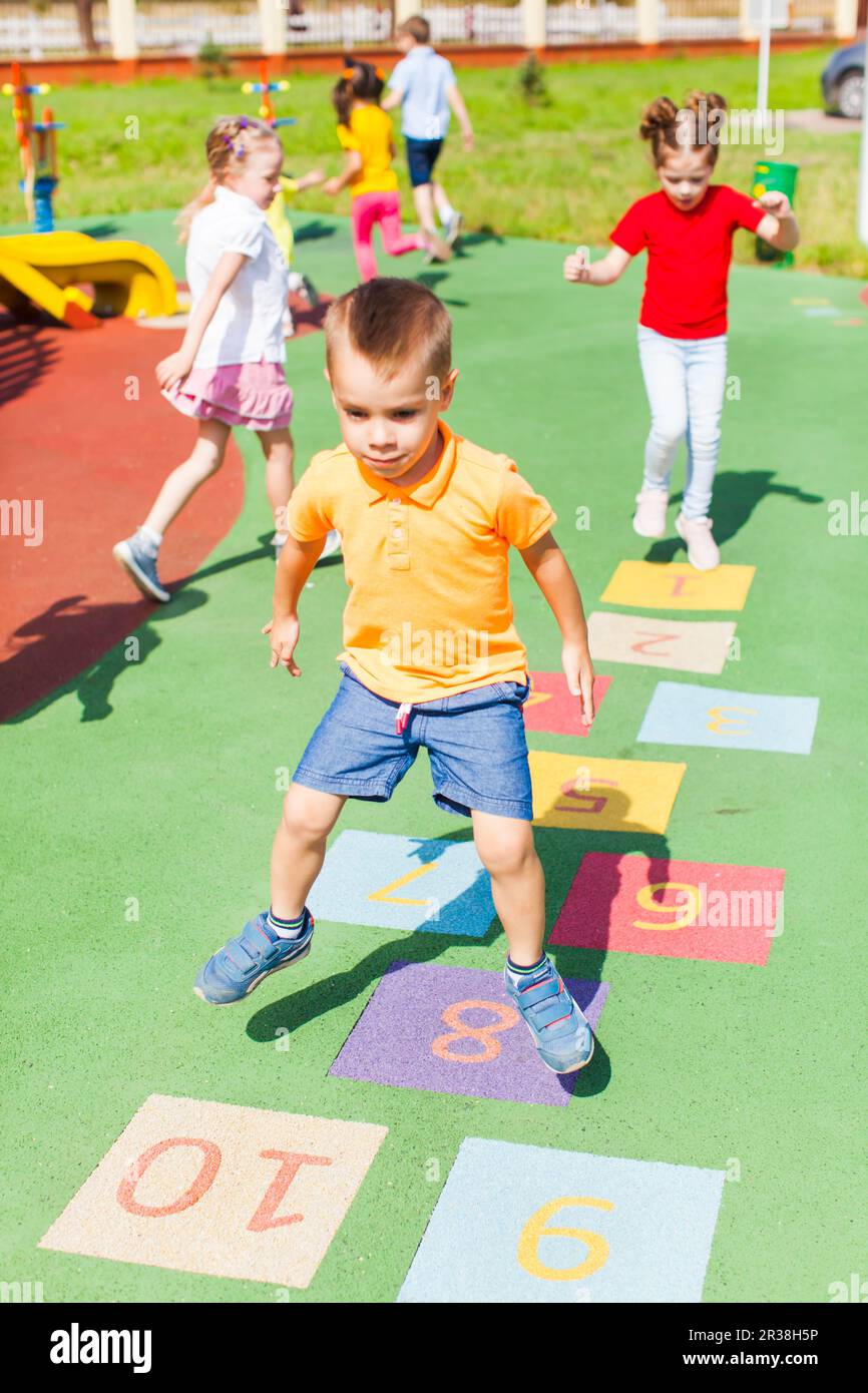 Children playing school play ground hi-res stock photography and images ...