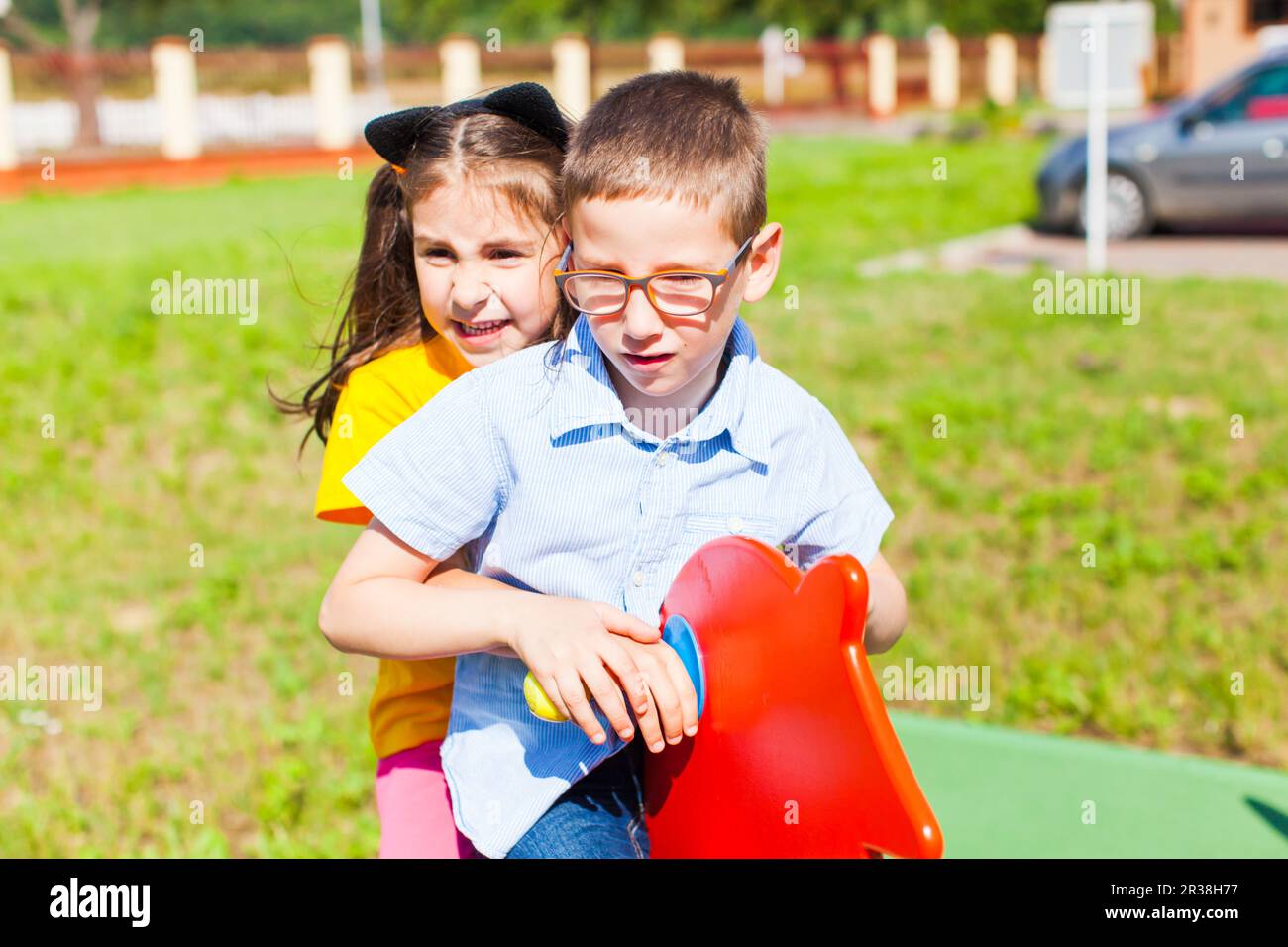 Joint games for brother and sister Stock Photo - Alamy