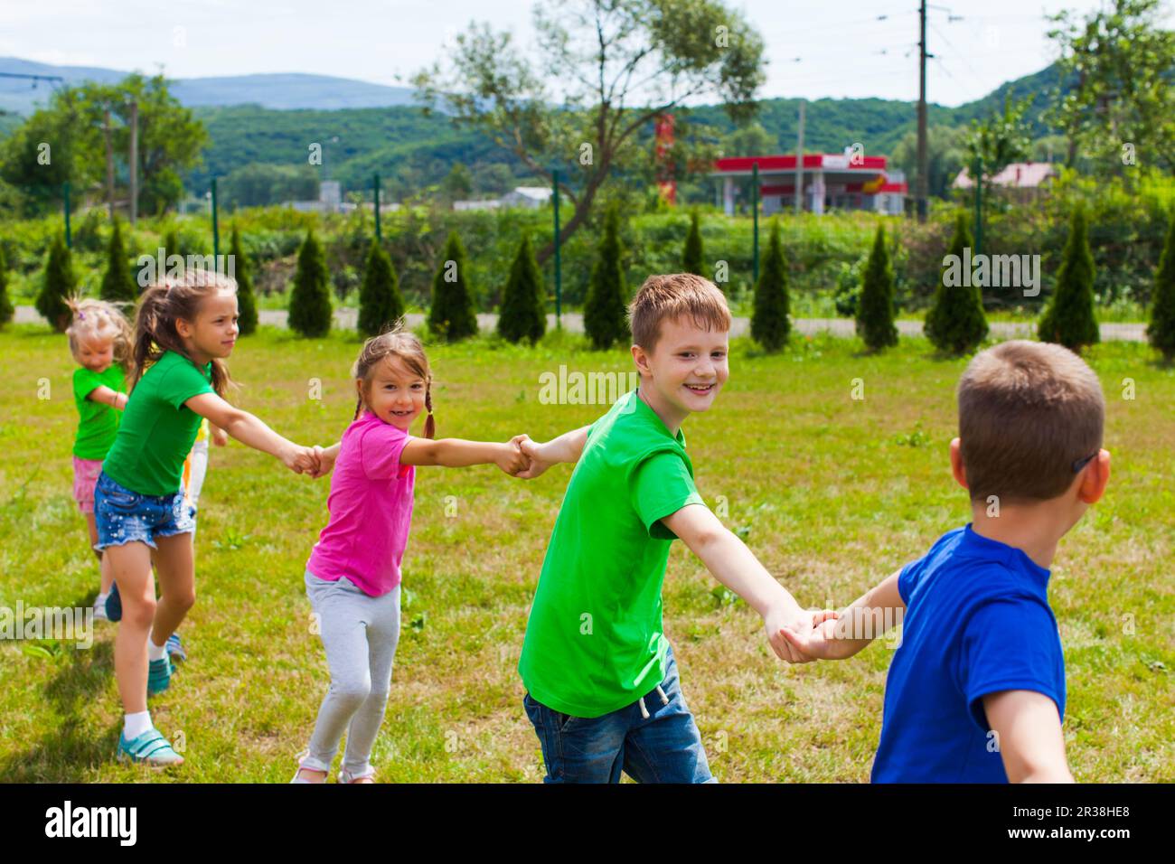 School children having a good time playing-around Stock Photo - Alamy