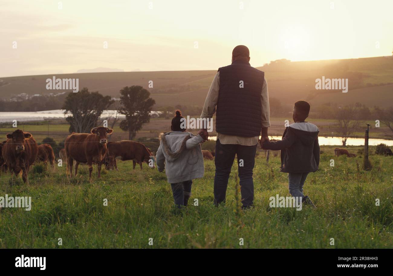 Family, holding hands and a father walking on a farm with children for agriculture or ...