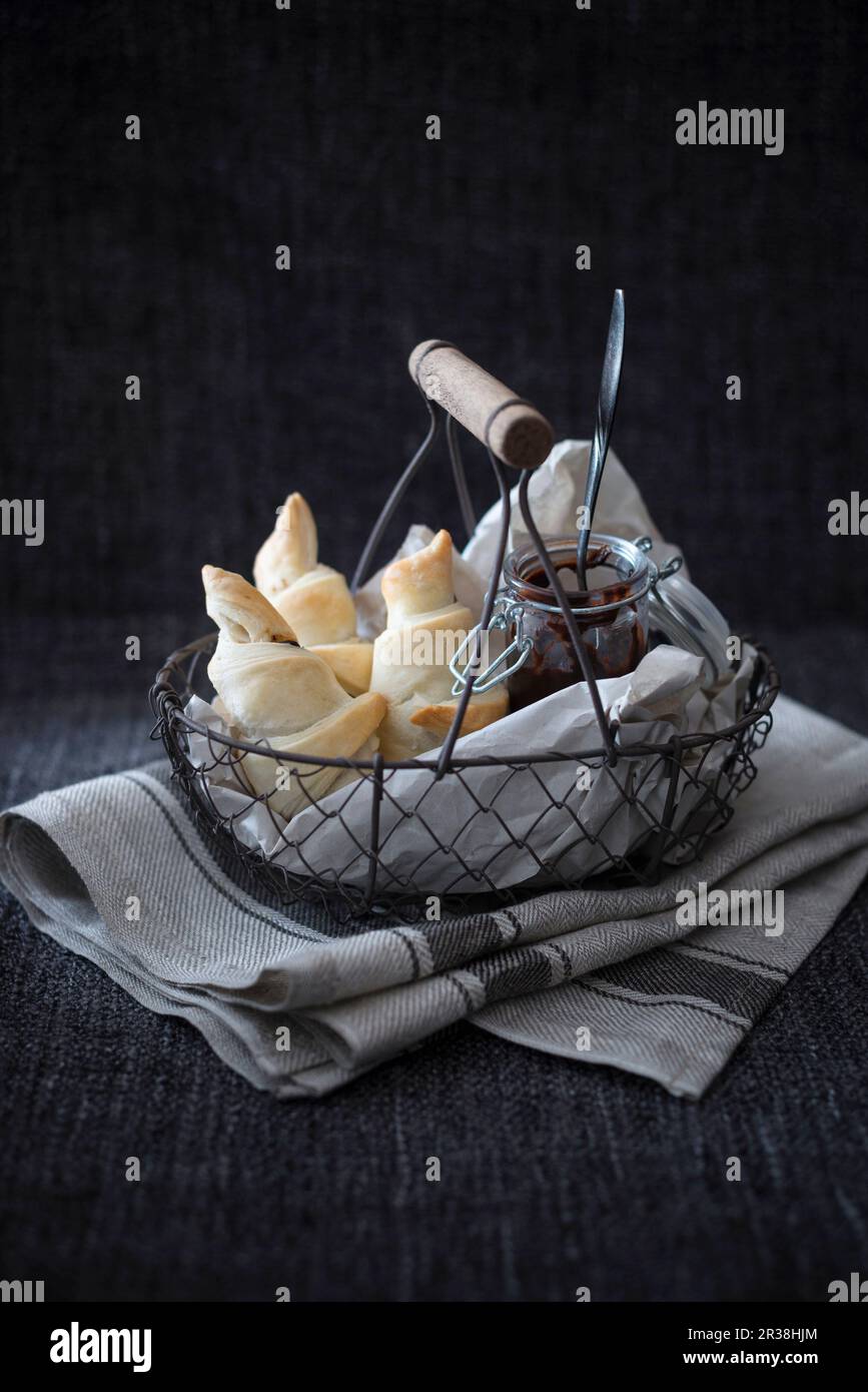 Vegan puff pastries filled with a sugar-free chocolate spread in a wire ...