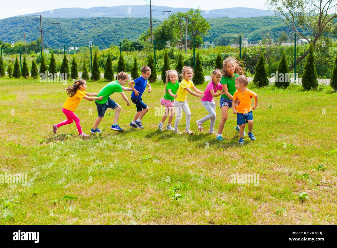Active children playing yard games Stock Photo - Alamy