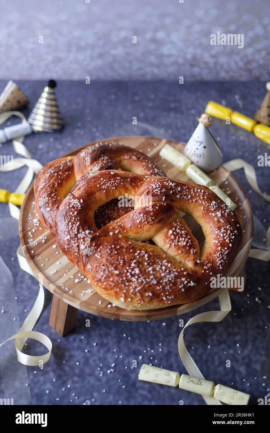New Year's pretzels with party decorations Stock Photo - Alamy