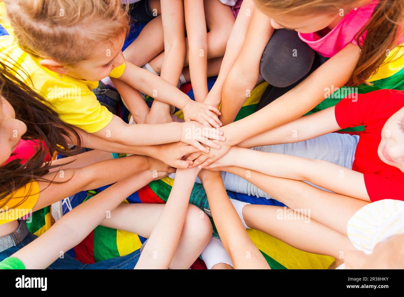 Close view of children's hand together Stock Photo - Alamy