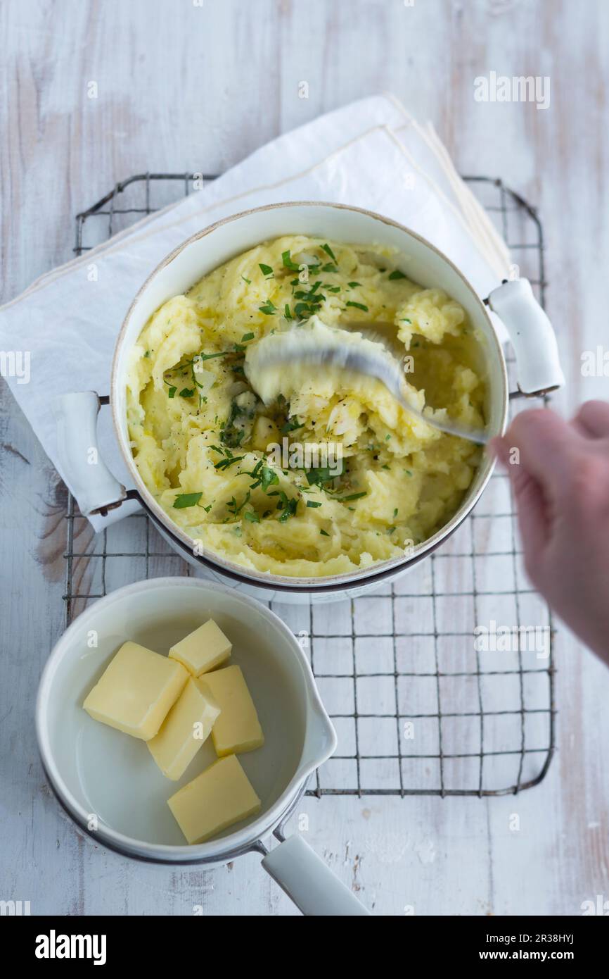 Homemade mashed potatoes with butter in a pot Stock Photo - Alamy