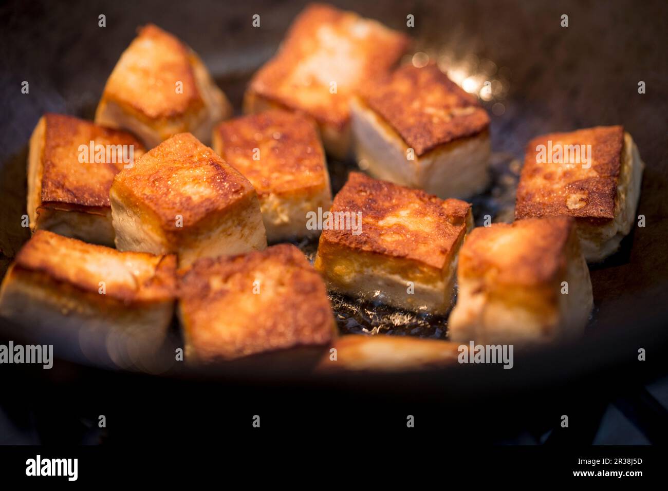 Fried tofu on pan close hi-res stock photography and images - Alamy