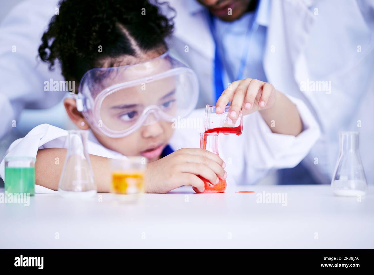 Science, research and child doing a experiment in a lab in physics or ...