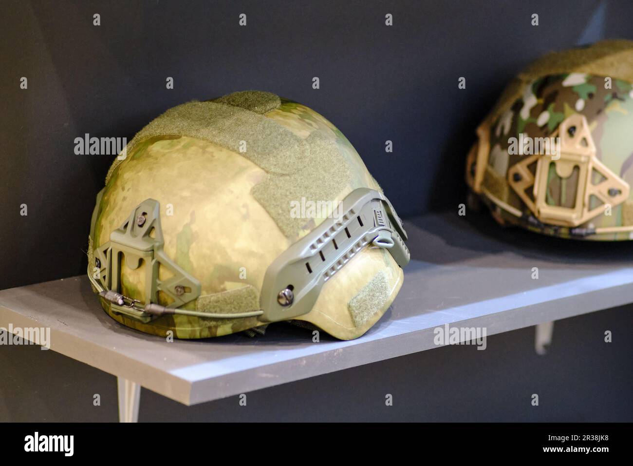The army shop displays the khaki-colored helmet that comes with the ...