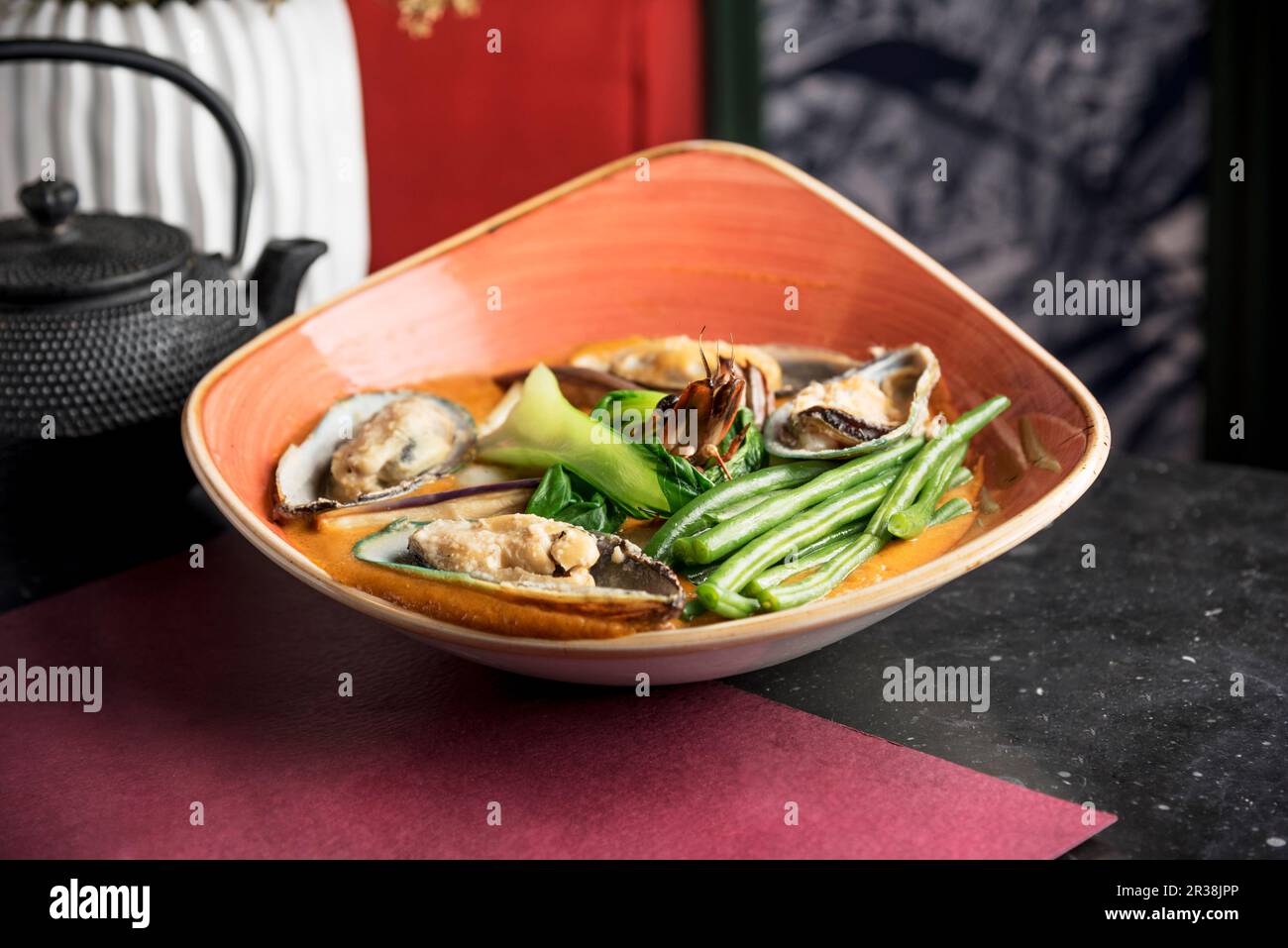 Filipino seafood stew Stock Photo - Alamy