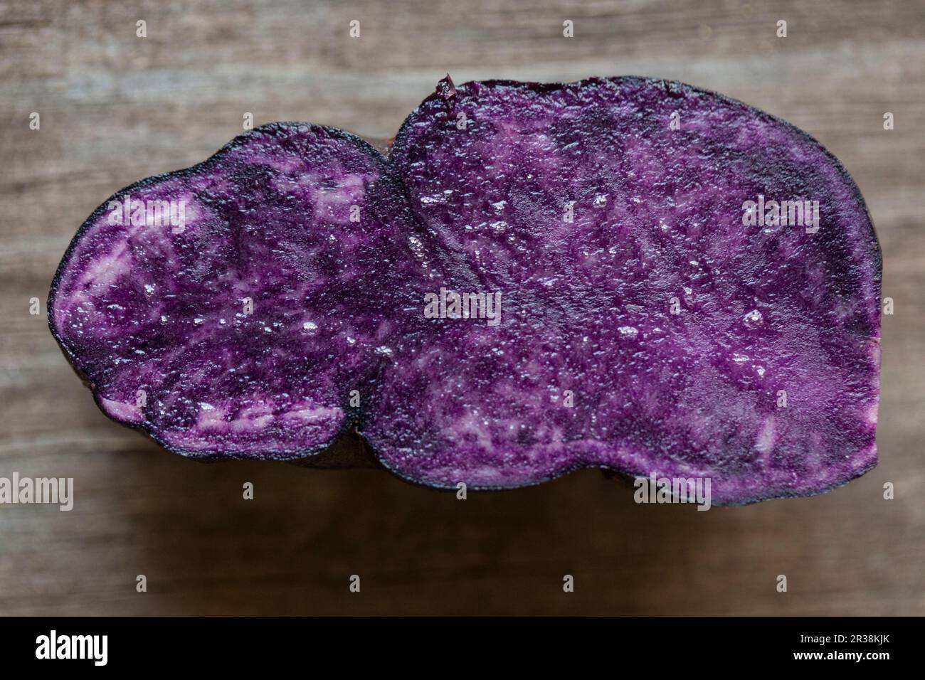 Blue Congo potatoes Stock Photo - Alamy
