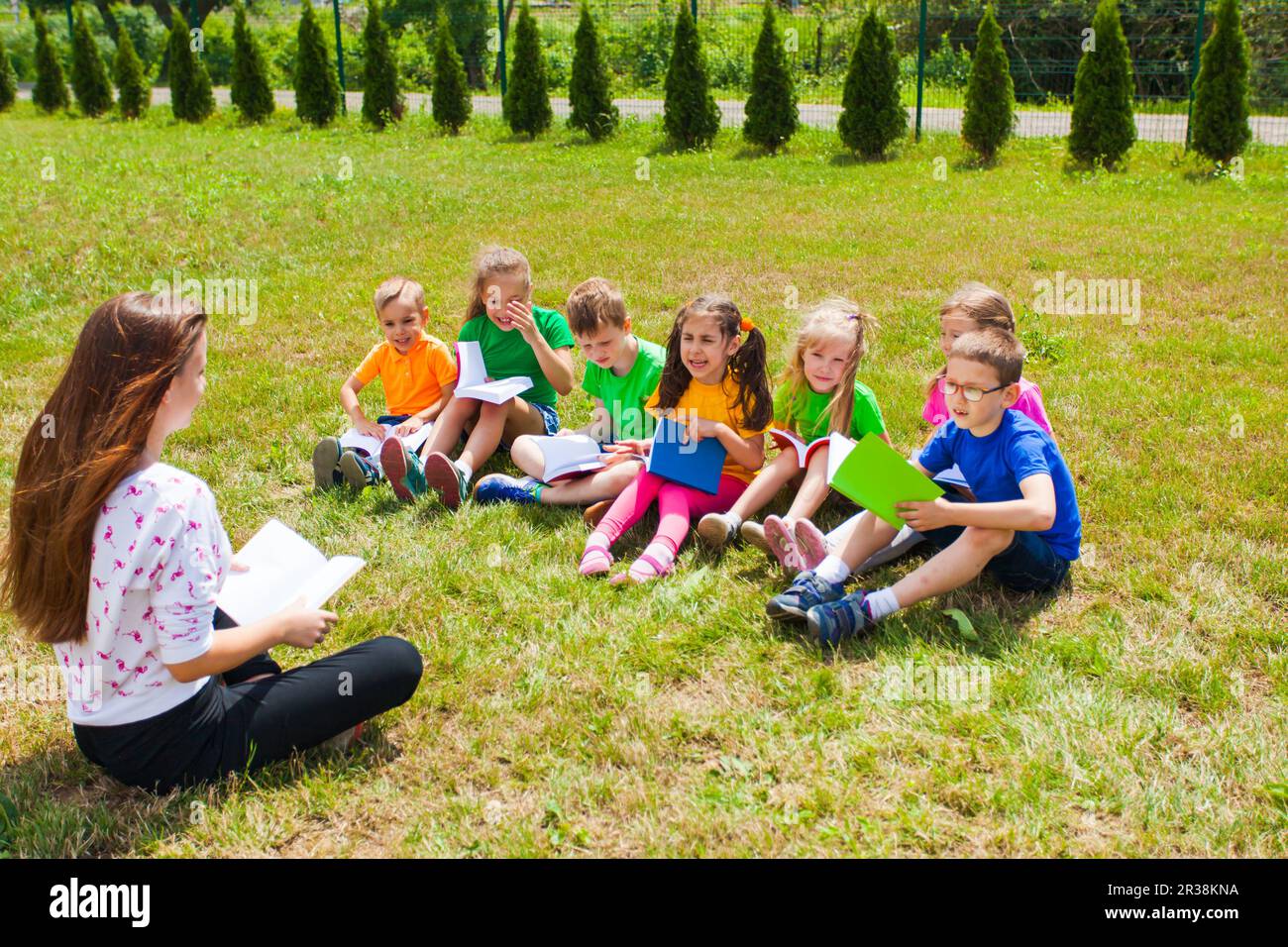 Extended day group in the summer outdoors Stock Photo - Alamy