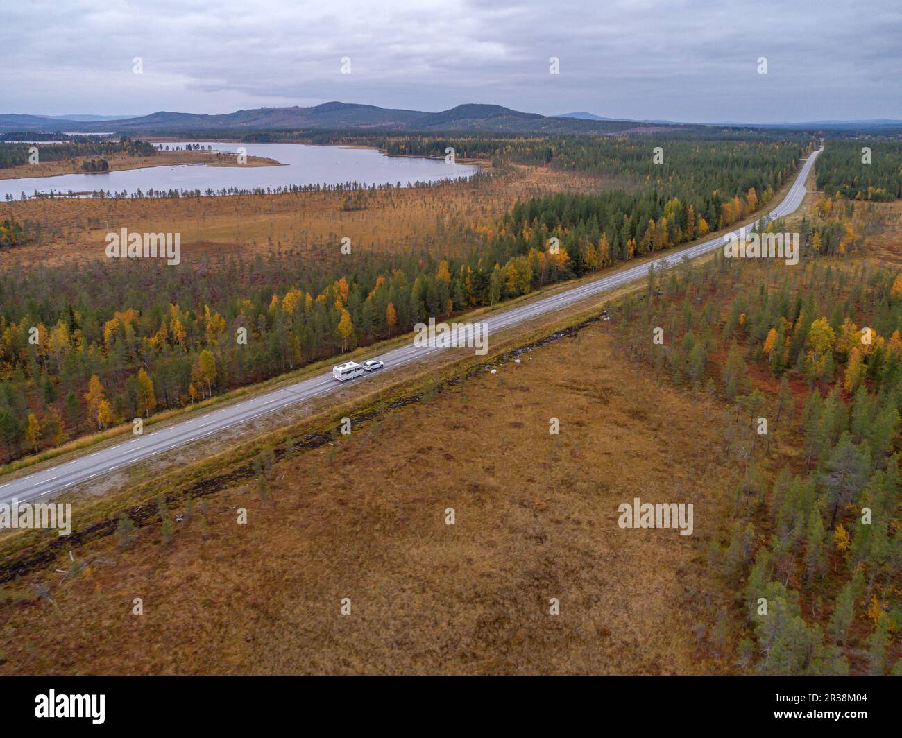 drone footgage Car Camping Caravan driving road lake Swedish Lapland ...