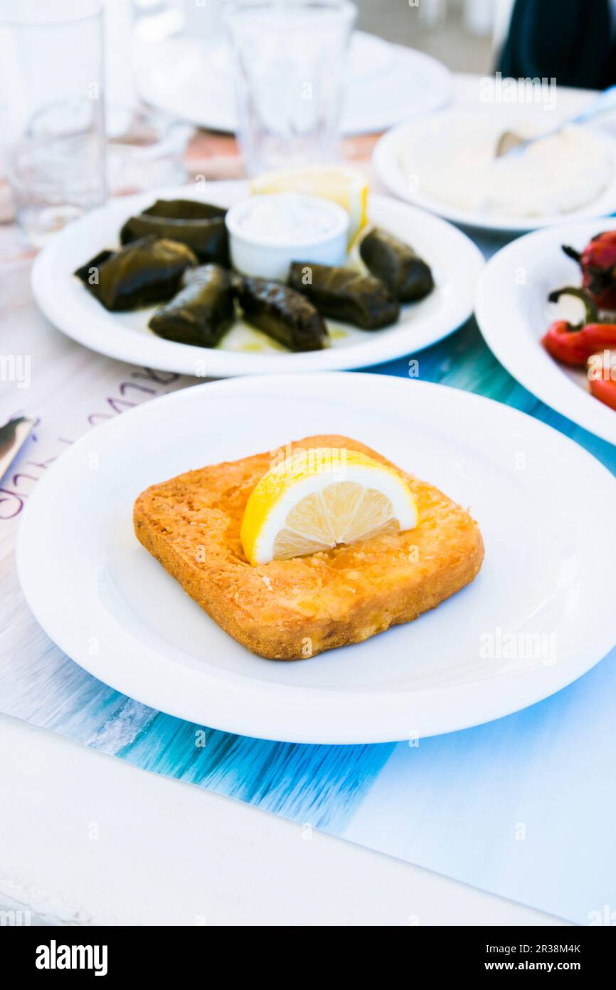 Saganaki - Greek fried feta Stock Photo - Alamy