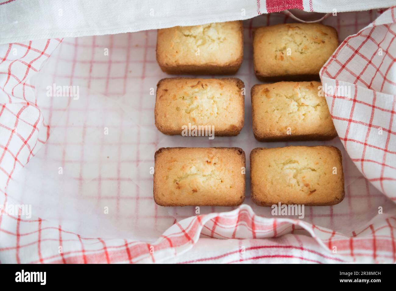 Unfinished Mini Coconut Cakes Stock Photo - Alamy