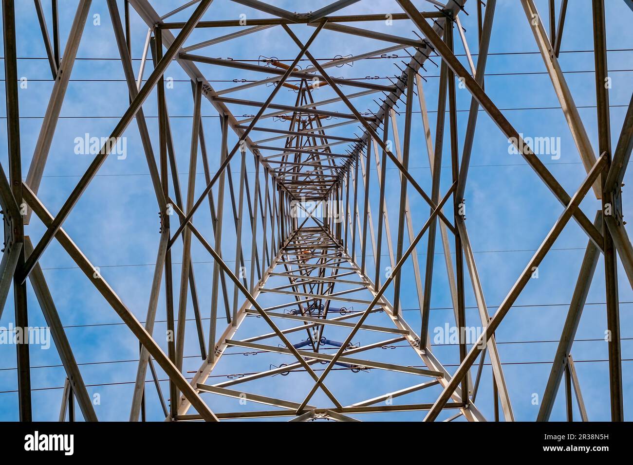 High voltage pole from below Stock Photo - Alamy