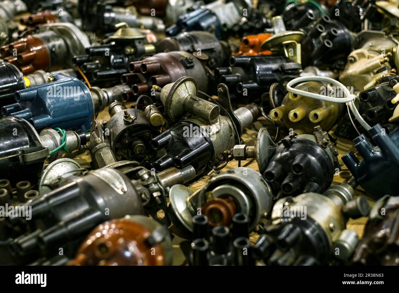 Old car distributors Stock Photo - Alamy