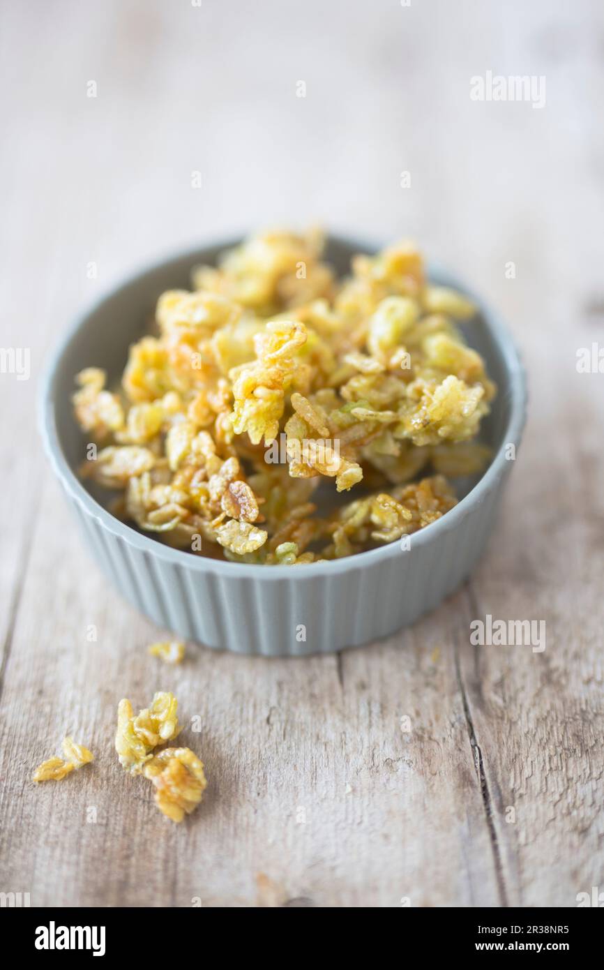 Green rice brittle in a bowl Stock Photo - Alamy