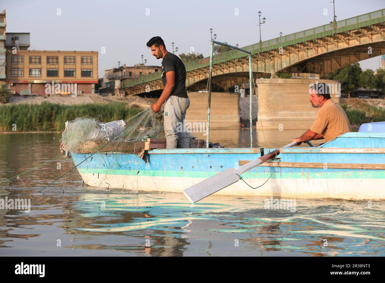 Baghdad, Iraq. 16th May, 2023. Fishermen work on the Tigris River in ...