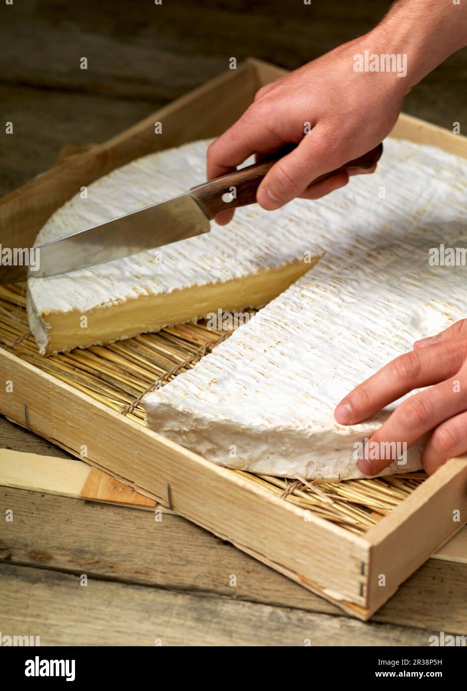 A wheel of brie, sliced Stock Photo - Alamy