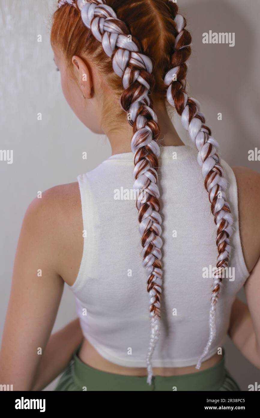 Braids, colored hair, hairstyle Stock Photo - Alamy