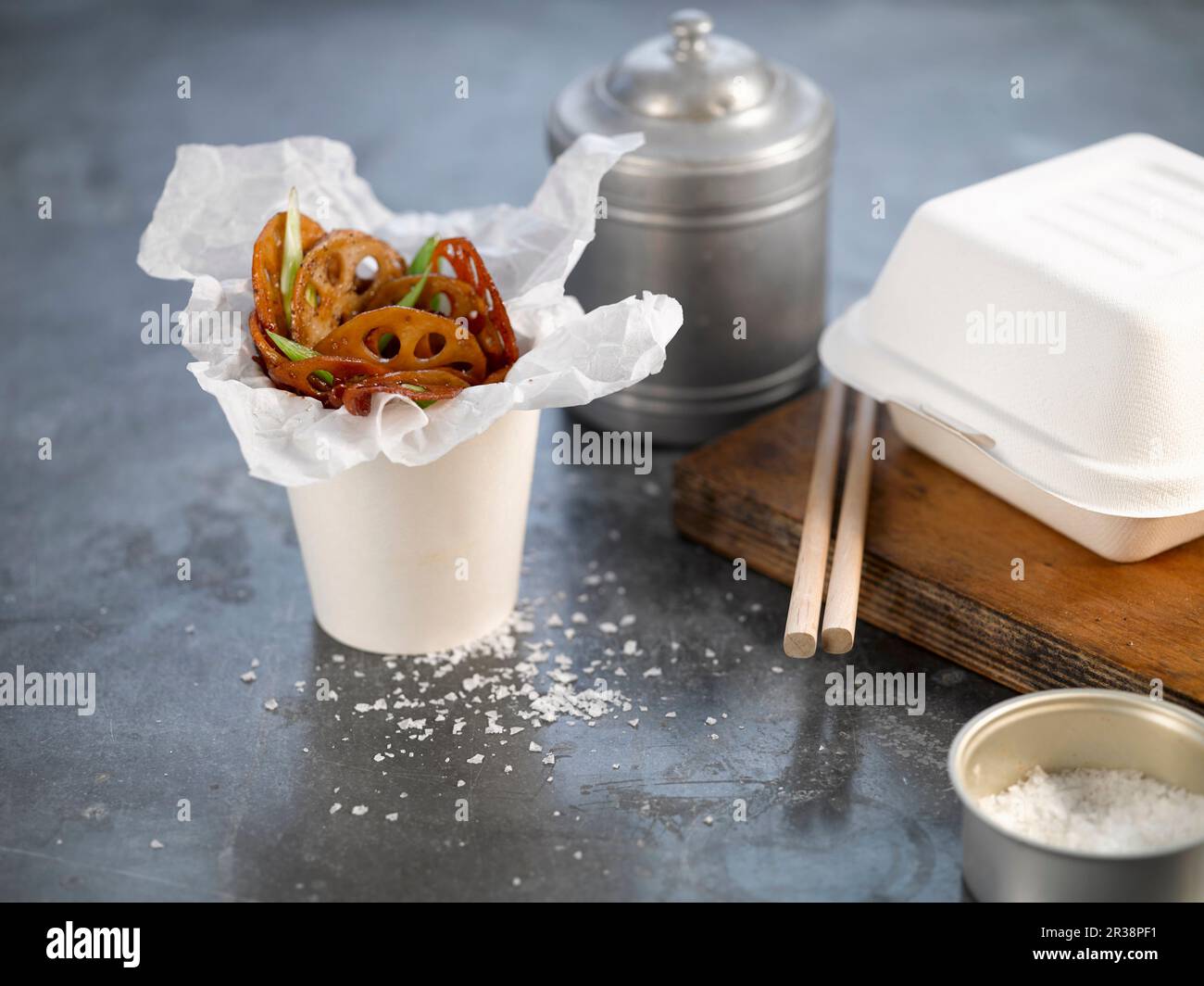 Stir fry with crispy lotus roots Stock Photo - Alamy