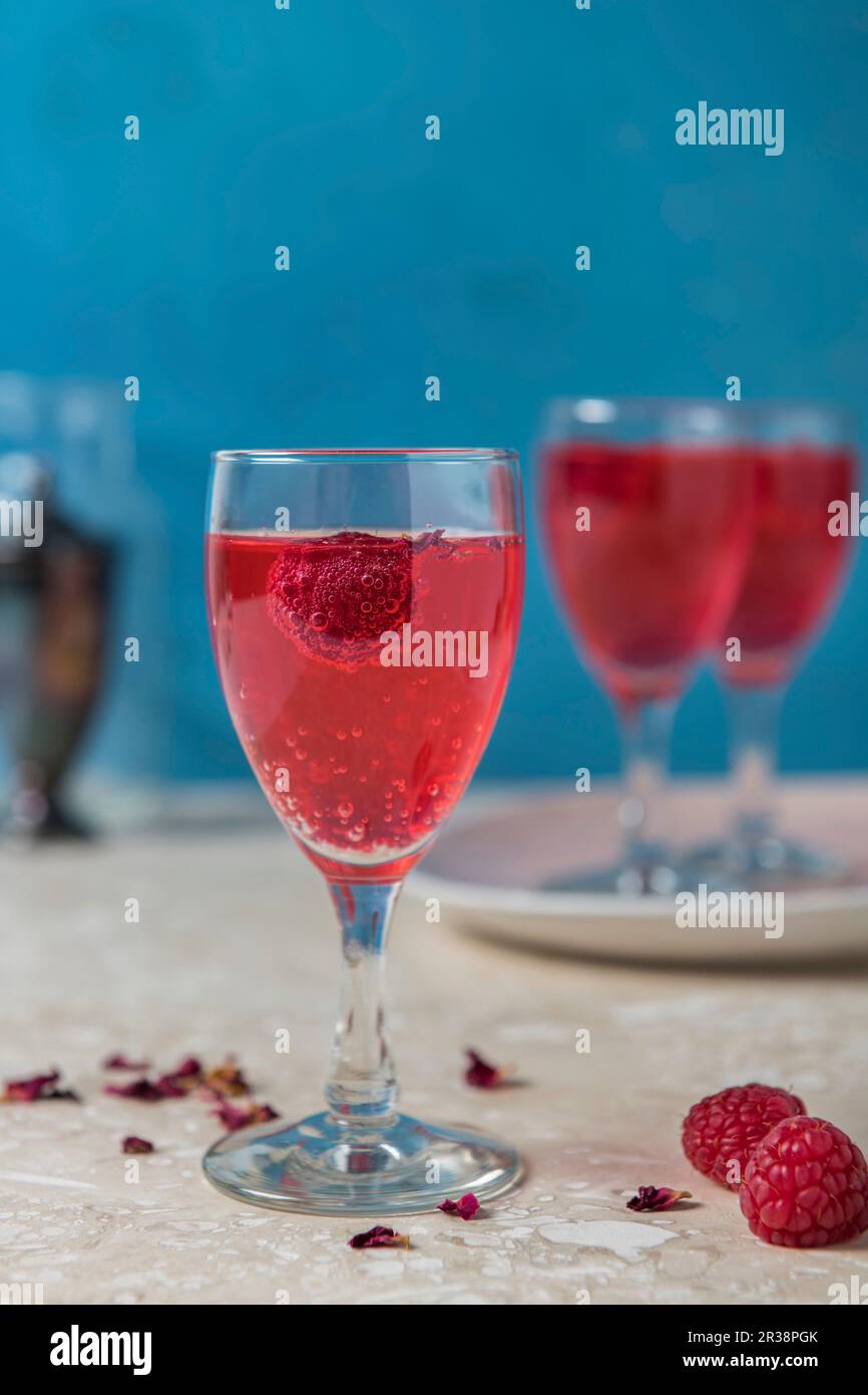 Rose and raspberry schnapps Stock Photo - Alamy