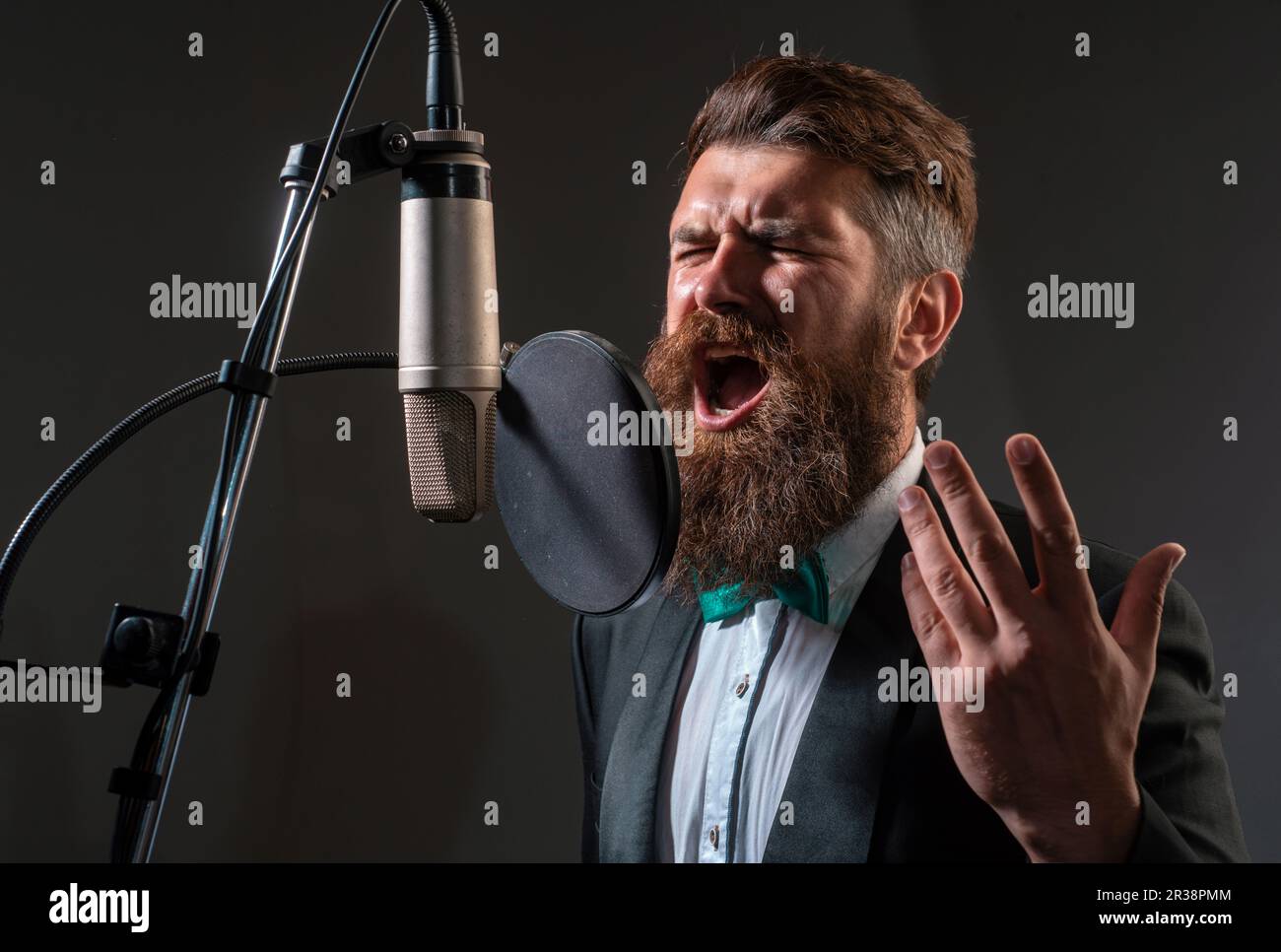 Classical music. Handsome man in recording studio. Music performance ...