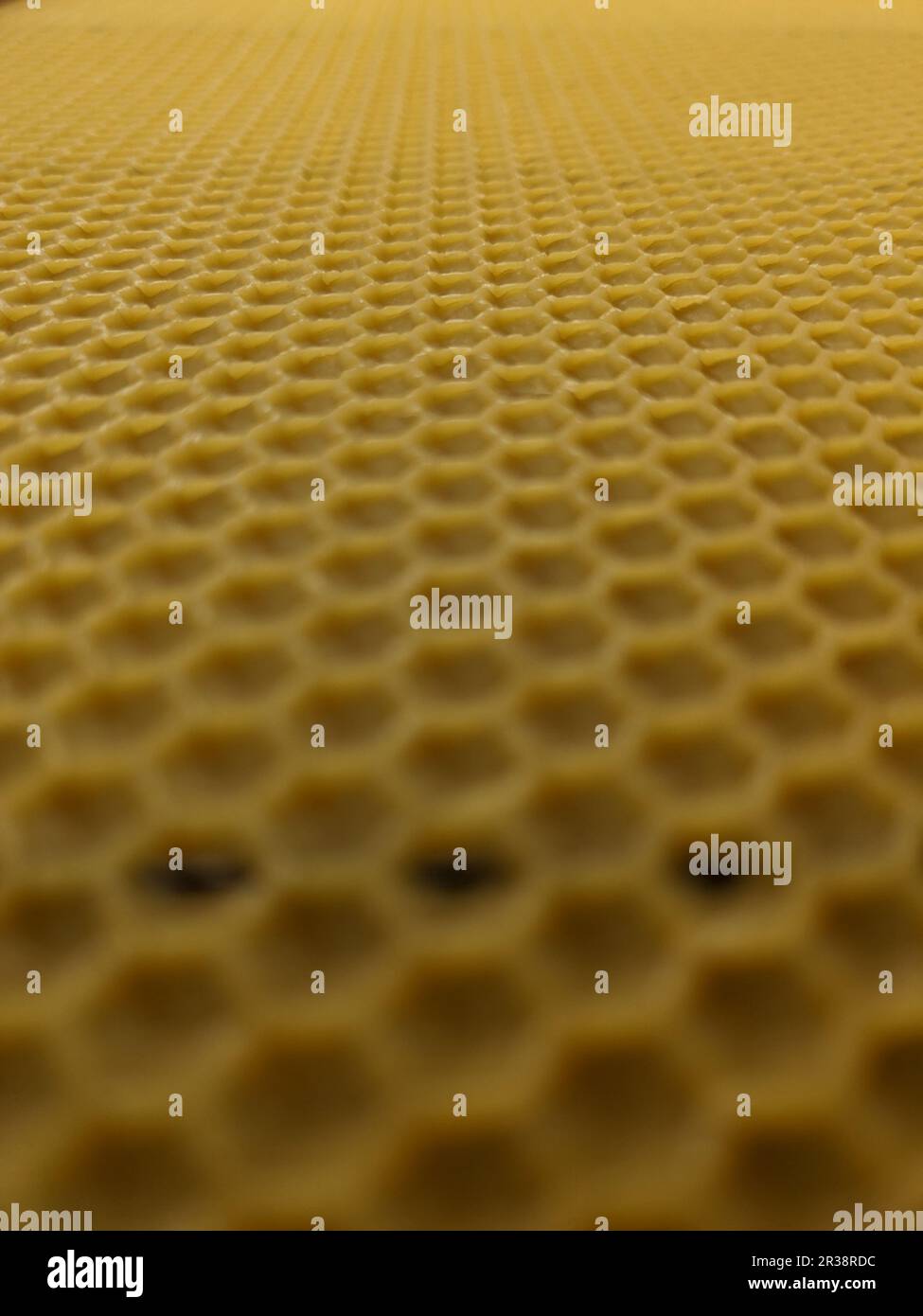 abstract background or texture background of yellow wax honeycomb ...