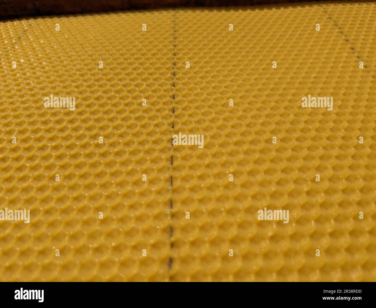 abstract background or texture background of yellow wax honeycomb ...