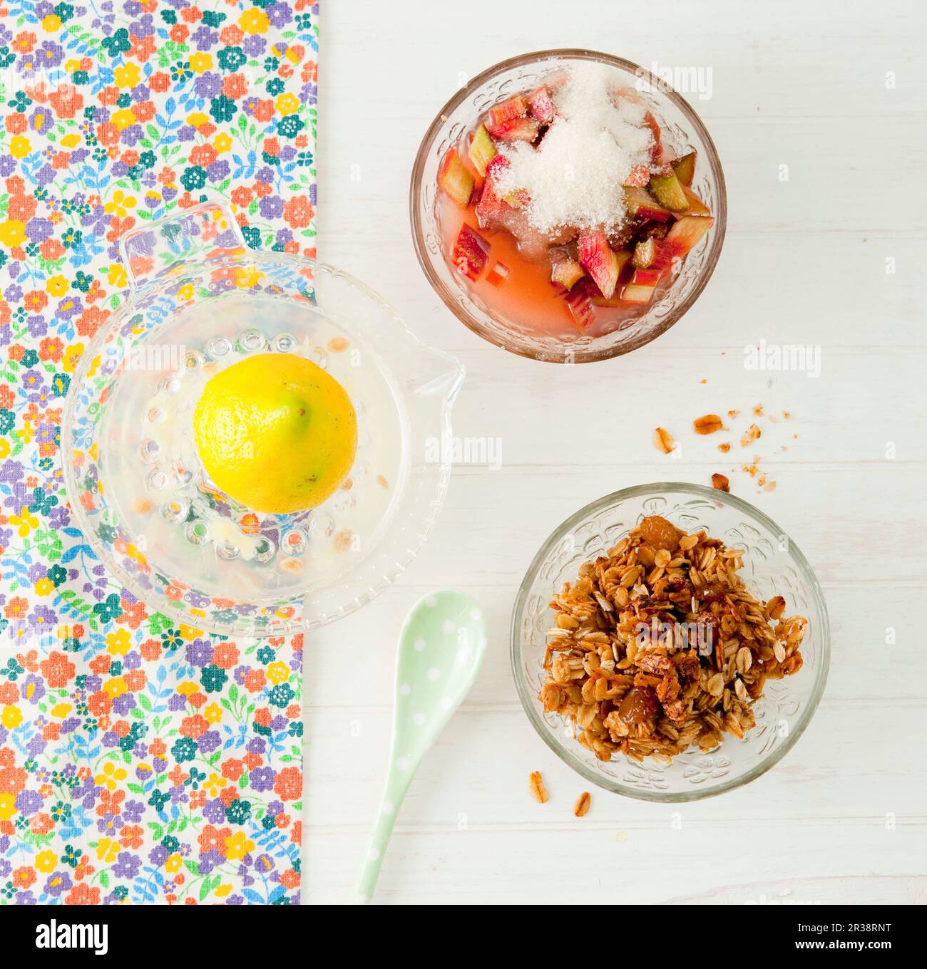 Raw rhubarb and crispy muesli Stock Photo - Alamy