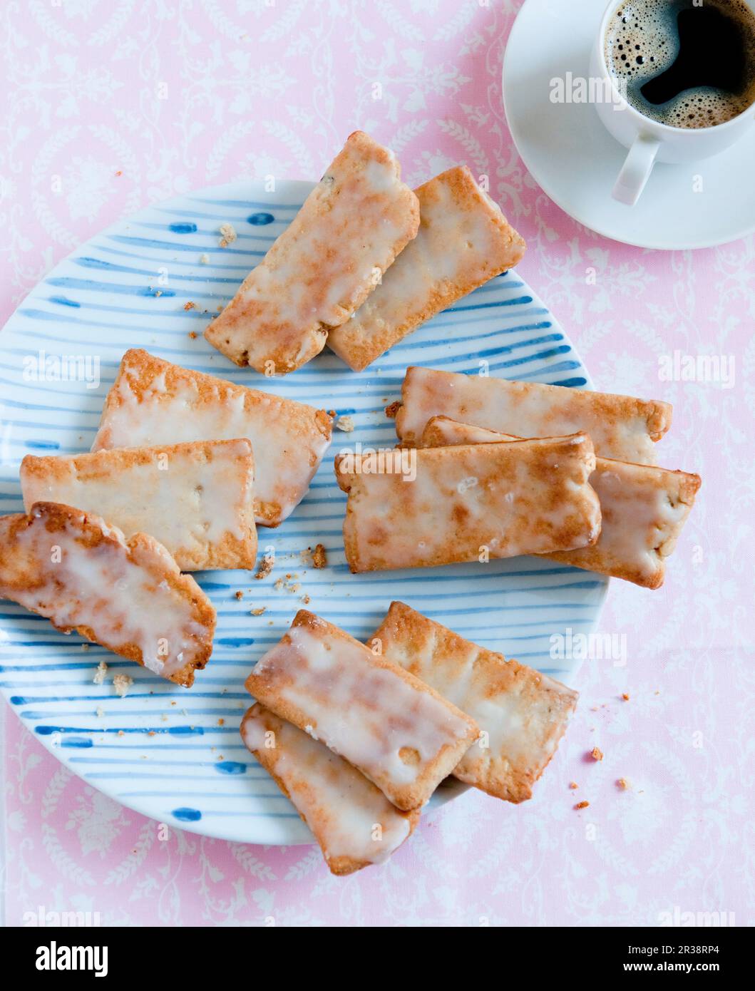 Coffee and iced biscuits Stock Photo - Alamy