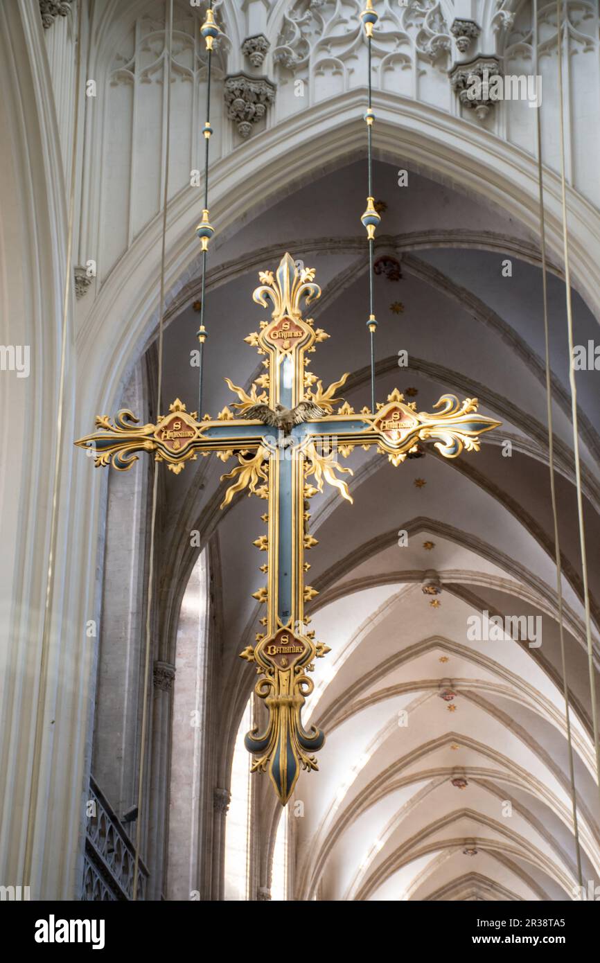 Huge Cross hanging down in Cathedral Stock Photo - Alamy