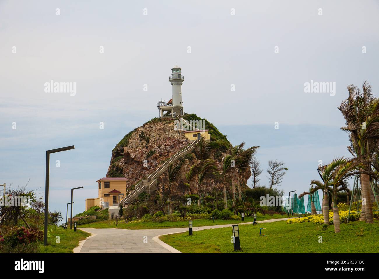 Lighthouse in fishing village hi-res stock photography and images - Alamy