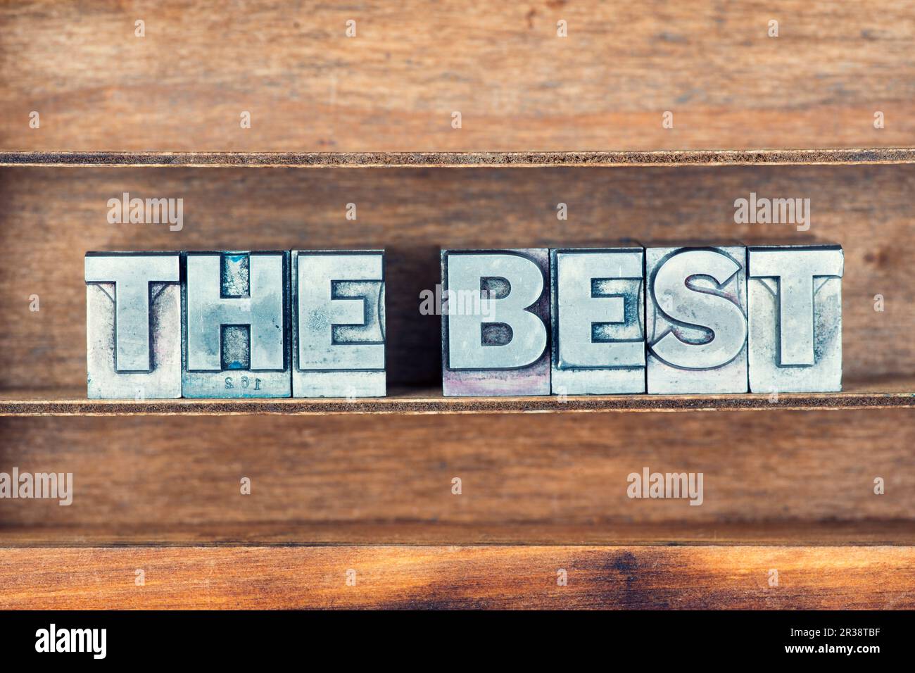 the best word made from metallic letterpress type on wooden tray Stock ...