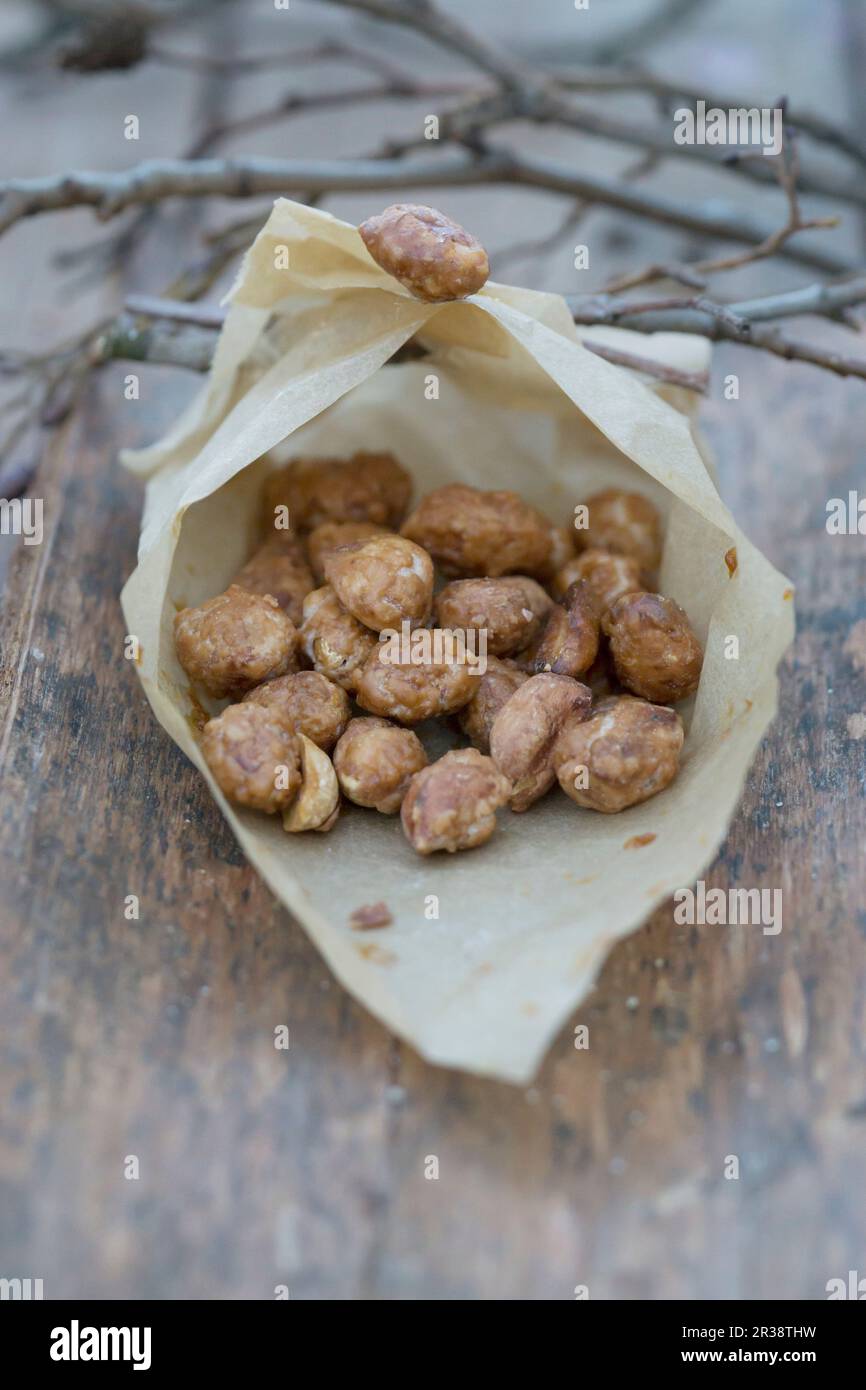 Homemade roasted almonds in a paper bag Stock Photo - Alamy