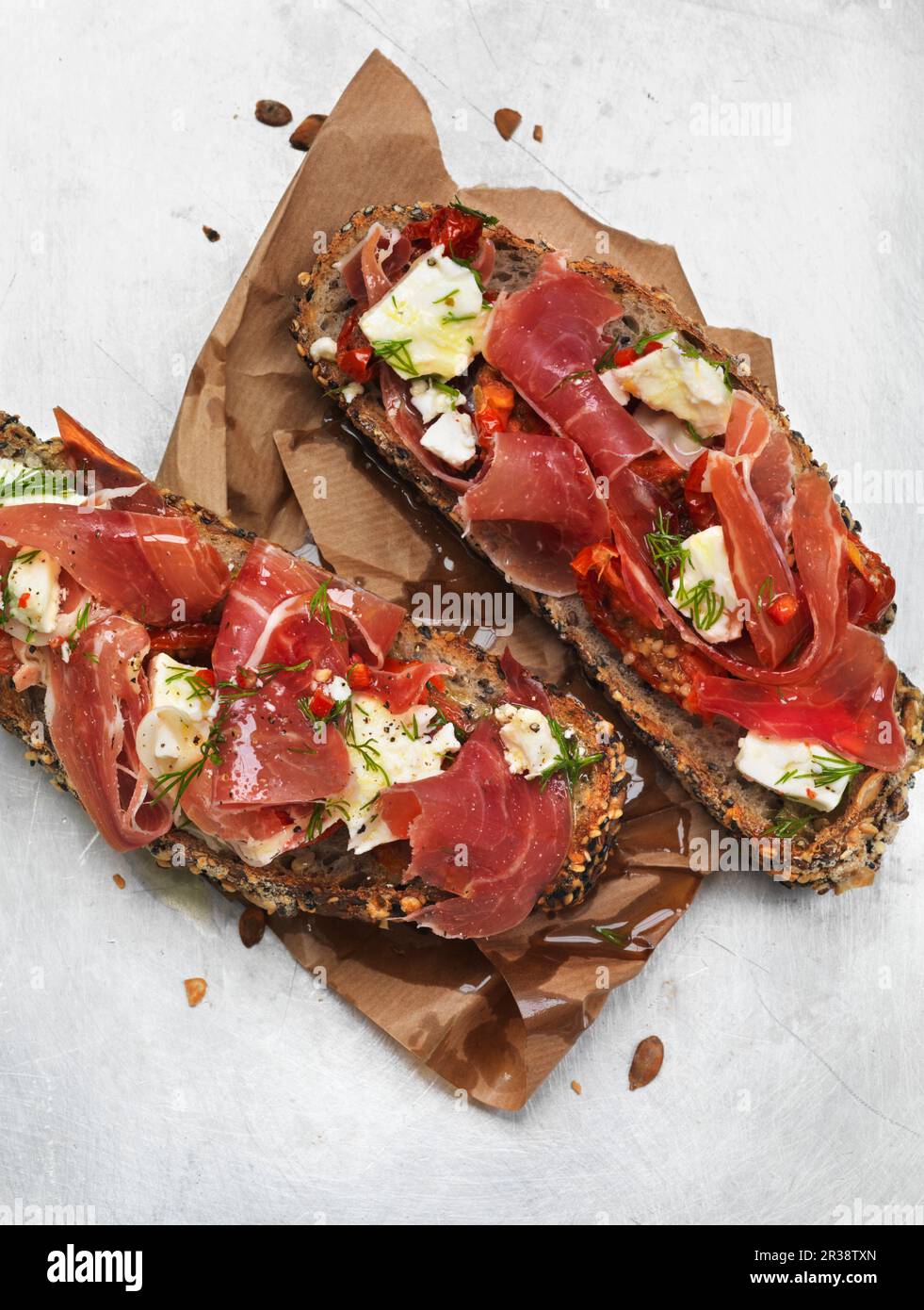 Open sandwich with Parma ham and cheese Stock Photo - Alamy