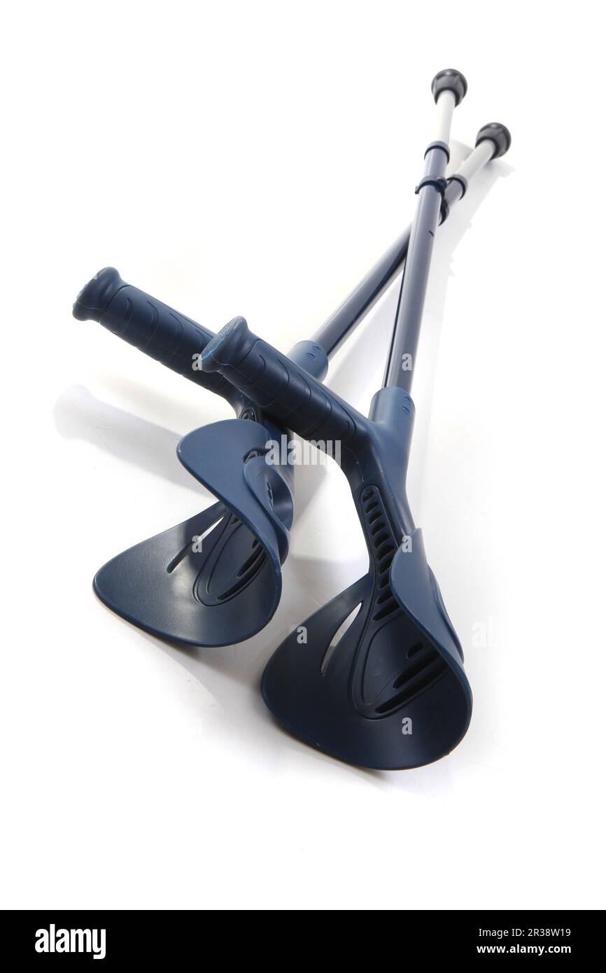 two crutches isolated on the white background Stock Photo - Alamy