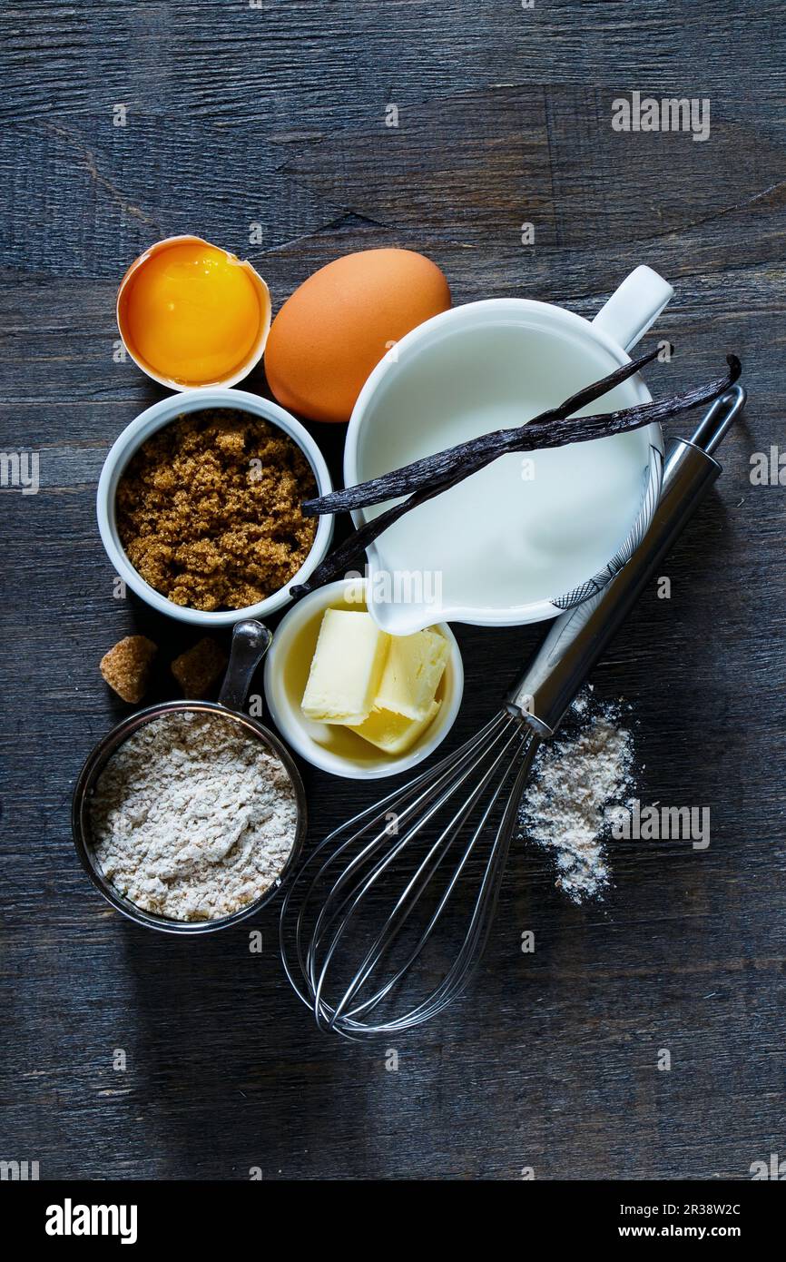 Still life with baking ingredients and utensils (top view Stock Photo ...