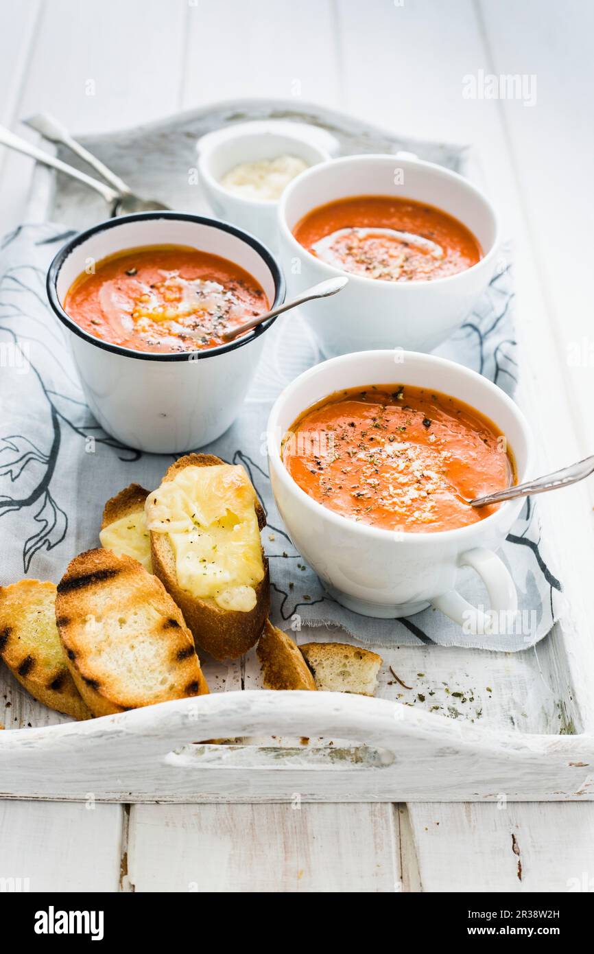 Cold tomato soup with oregano, pecorino and toasted bread Stock Photo ...
