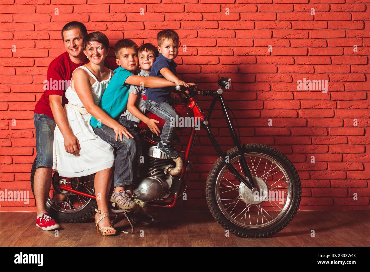 The concept of family travel on a motorcycle Stock Photo - Alamy