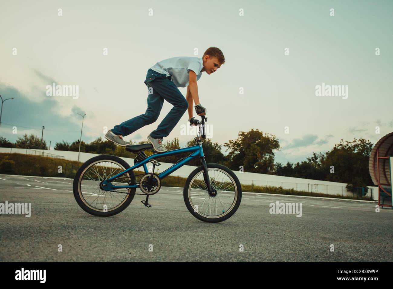 Blond boy on bike hi-res stock photography and images - Alamy