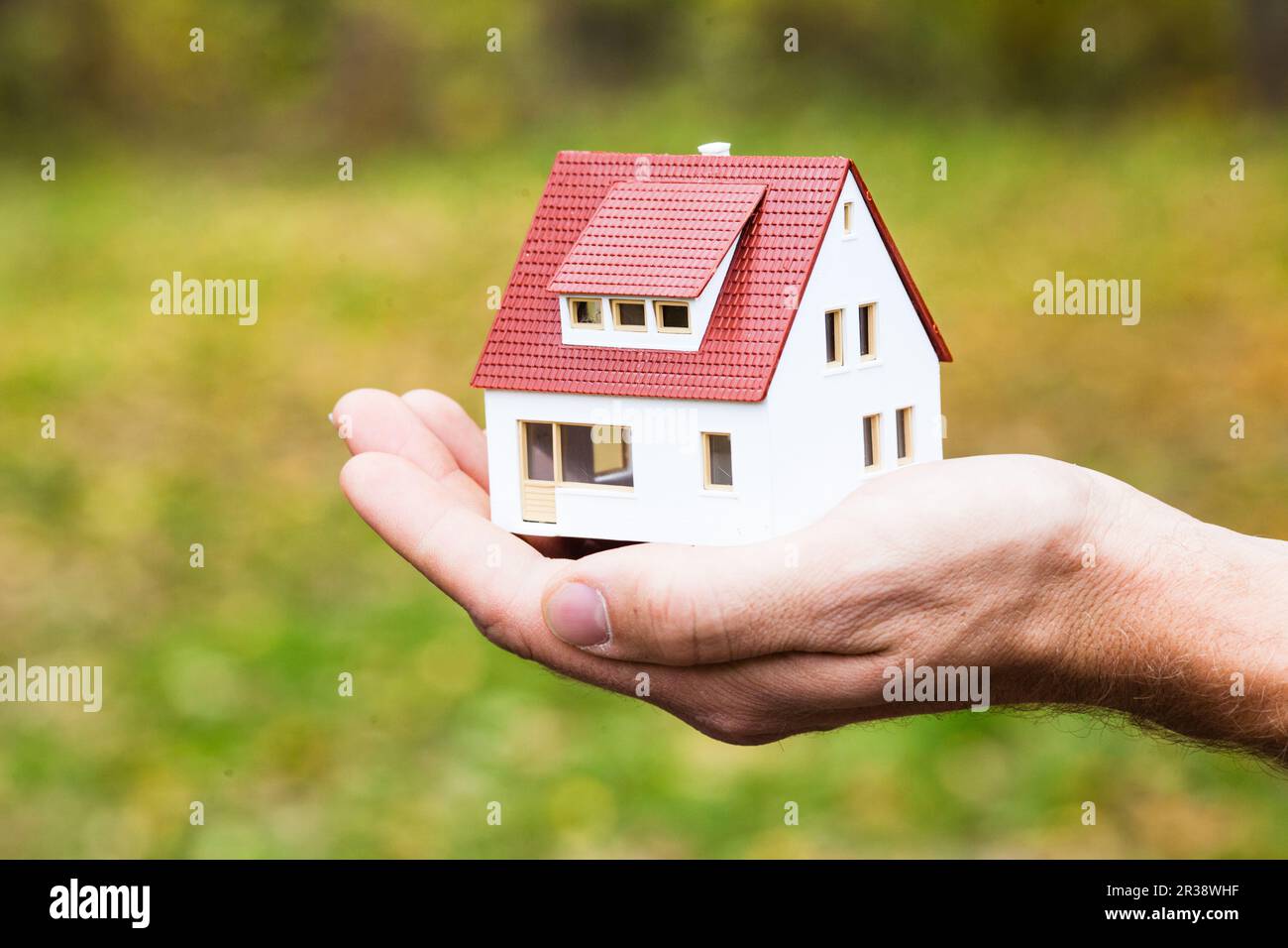 Hand support home hi-res stock photography and images - Alamy