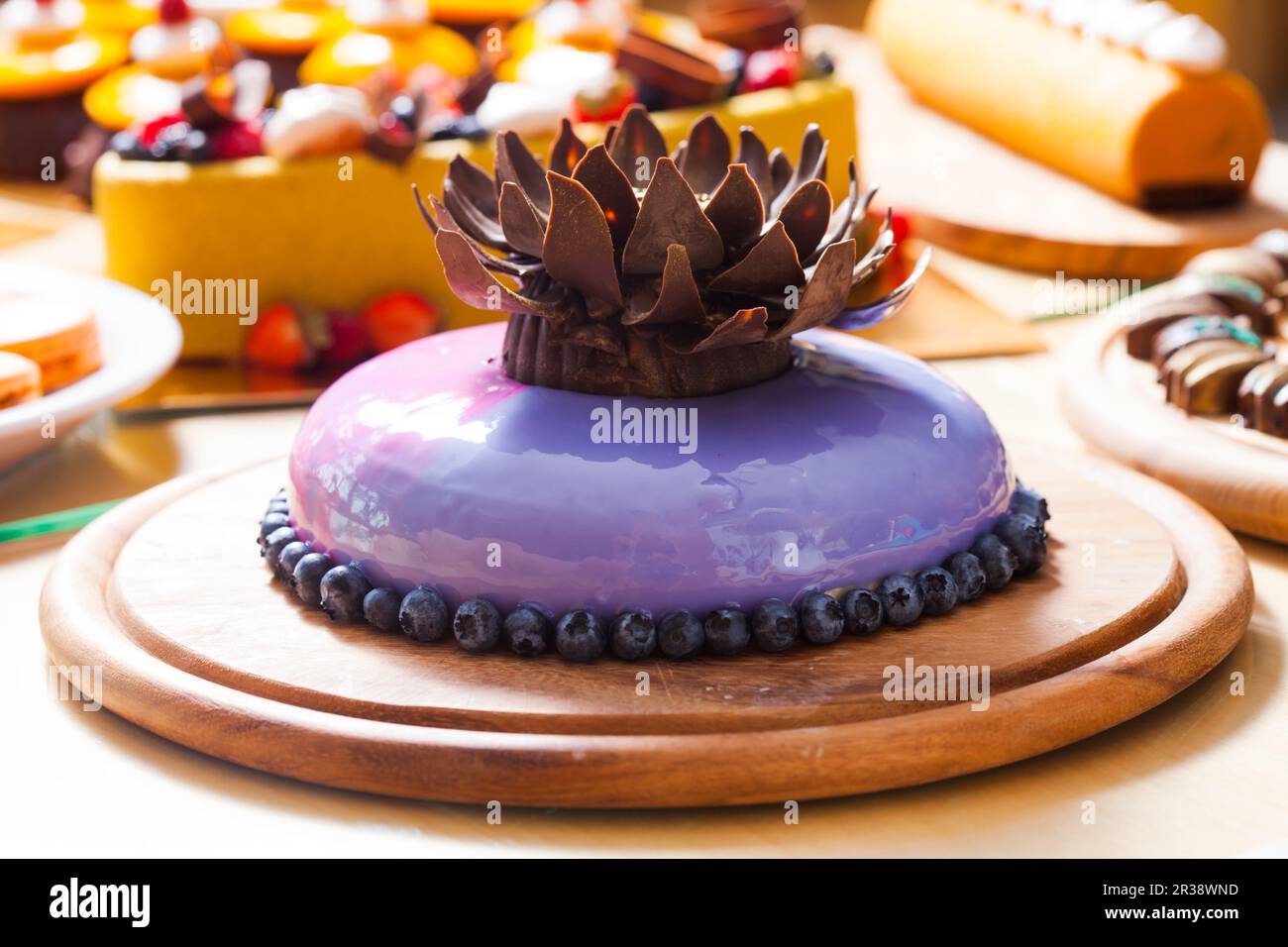 Showcase with modern dessert - cakes and sweets Stock Photo - Alamy