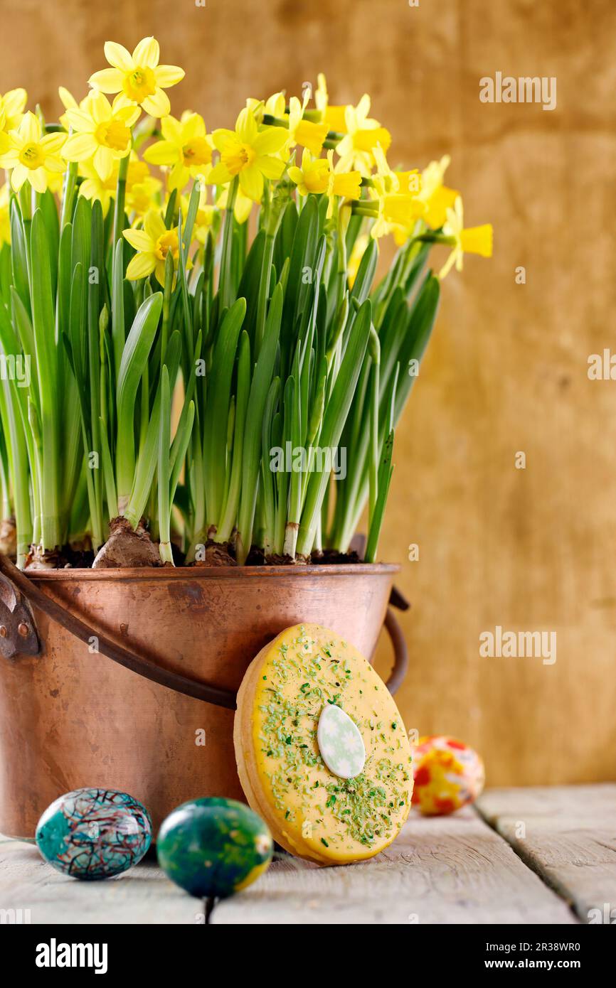 Egg-shaped Hanseatic Easter cake leaning against a copper pot of ...
