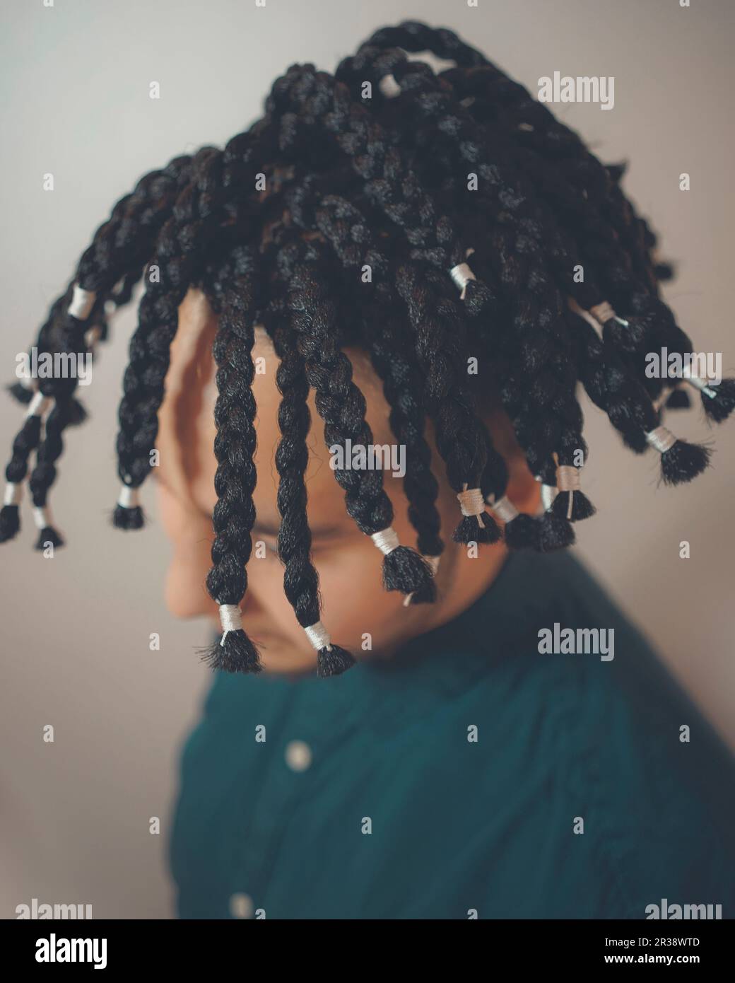 Men's hair from thick braids Stock Photo - Alamy