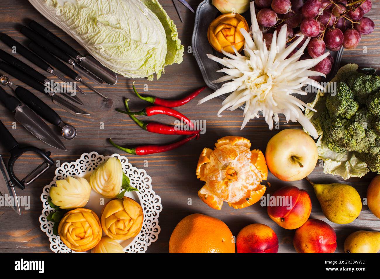 Chinese fruit carving, flat lay props on the table Stock Photo - Alamy