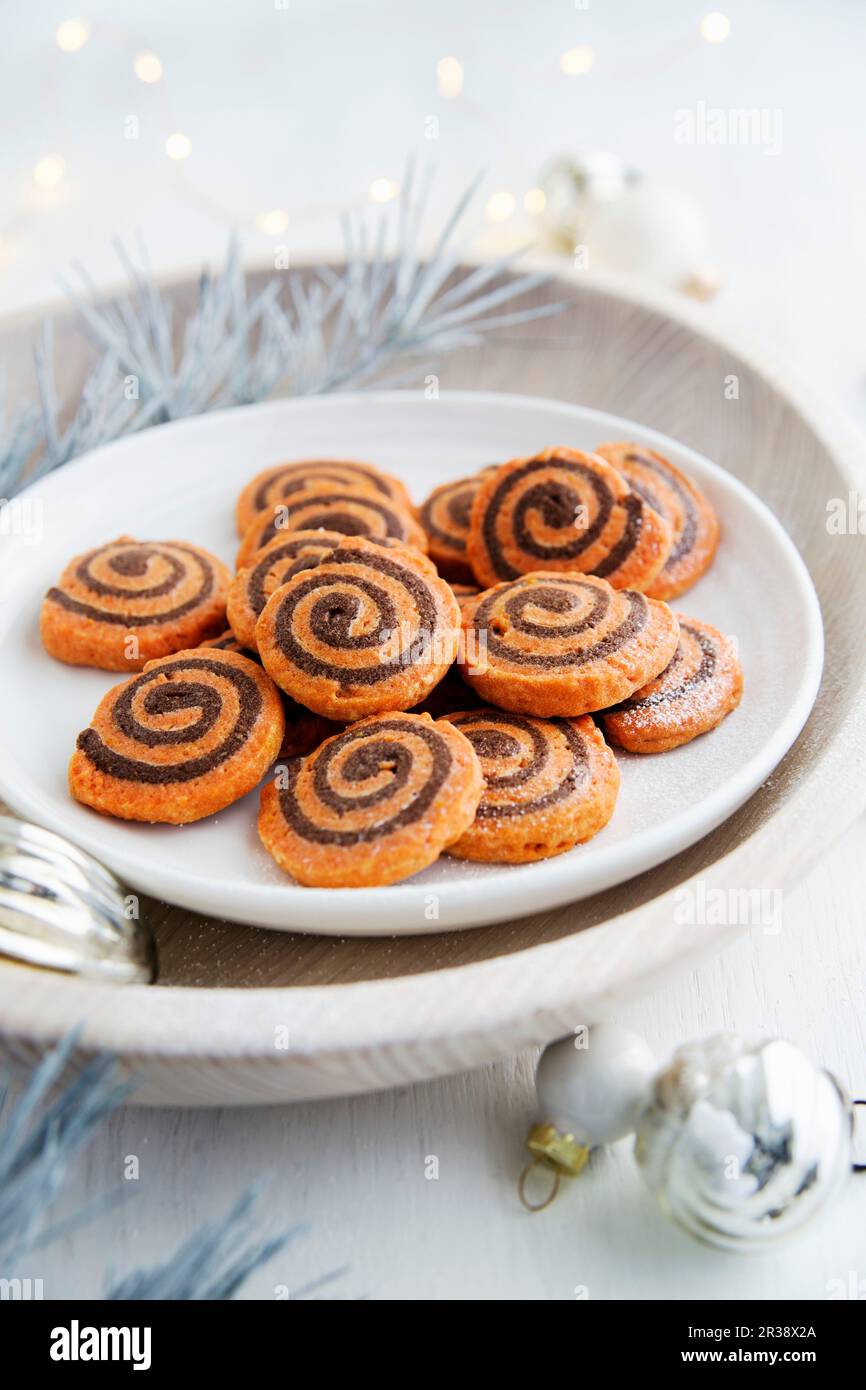 Orange and chocolate pinwheel biscuits Stock Photo - Alamy