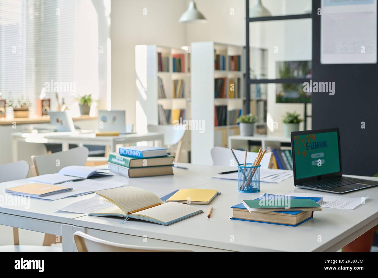 Modern classroom of foreign language school with books and laptop for ...