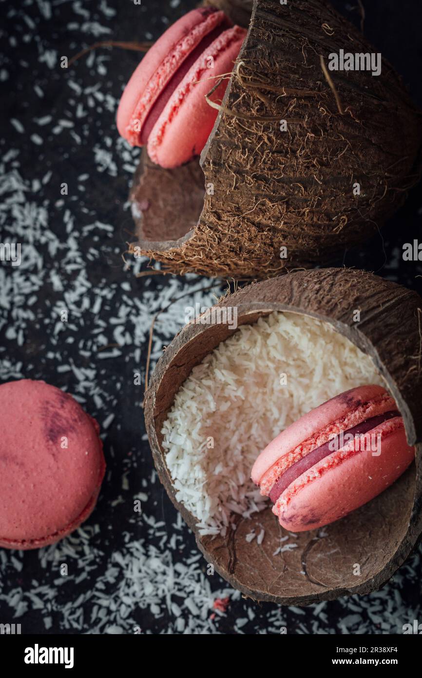 Raspberry macaroons with grated coconut Stock Photo - Alamy